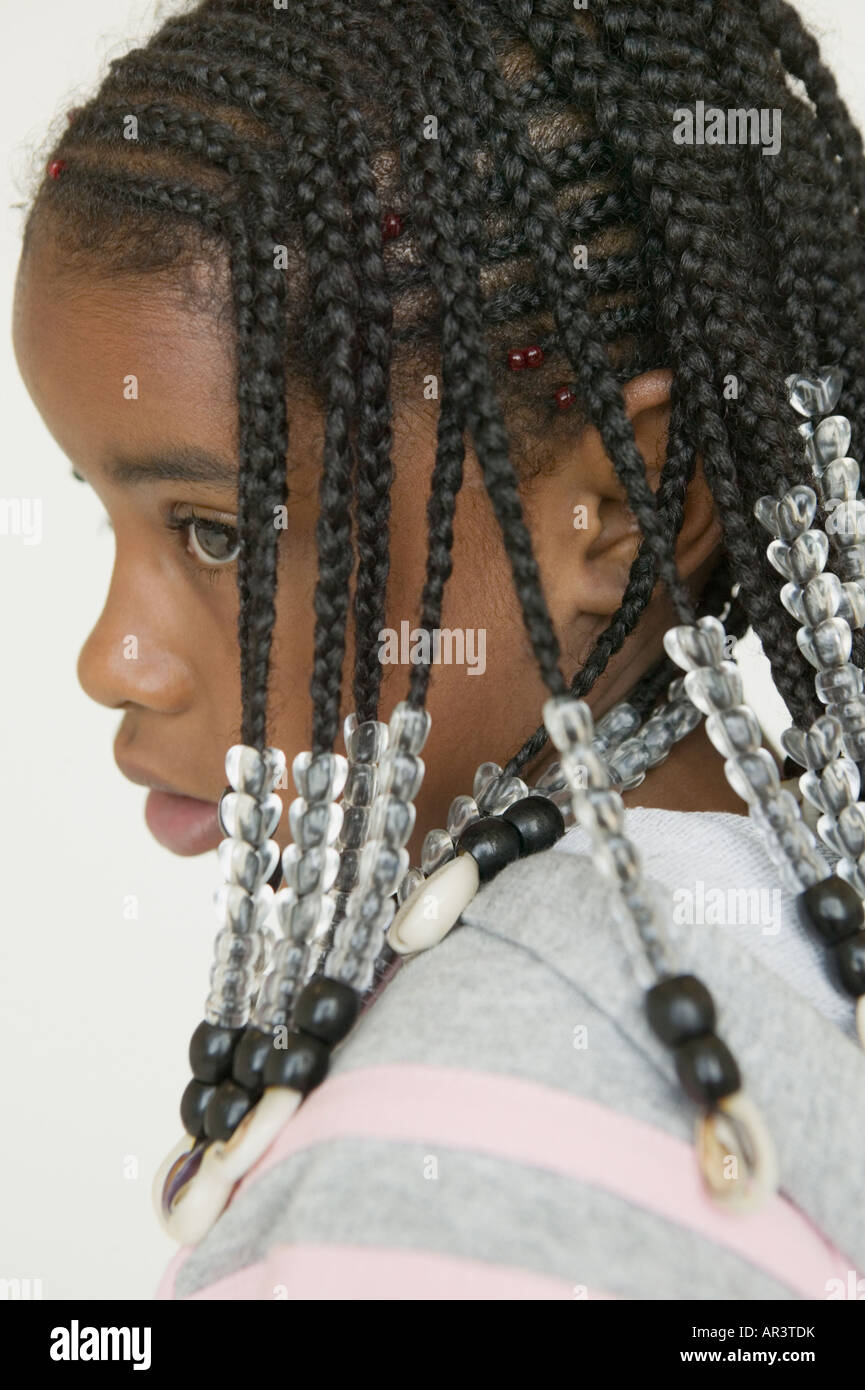 Close up of African girl with braids Stock Photo - Alamy