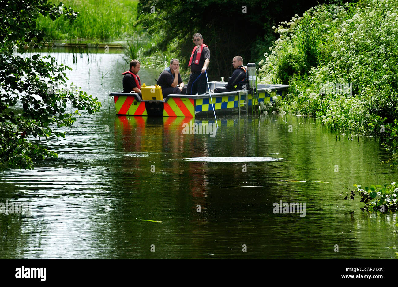 Police diving teams searching the River Marden, Calne Stock Photo - Alamy