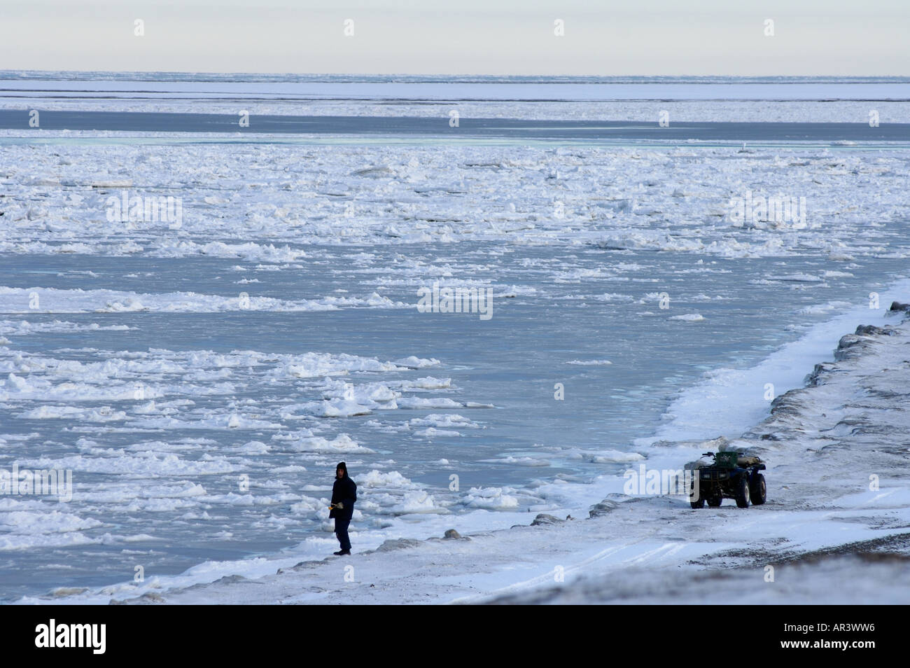 inupiat elder Jimmy Soplu along the Arctic coast during fall freeze up ...