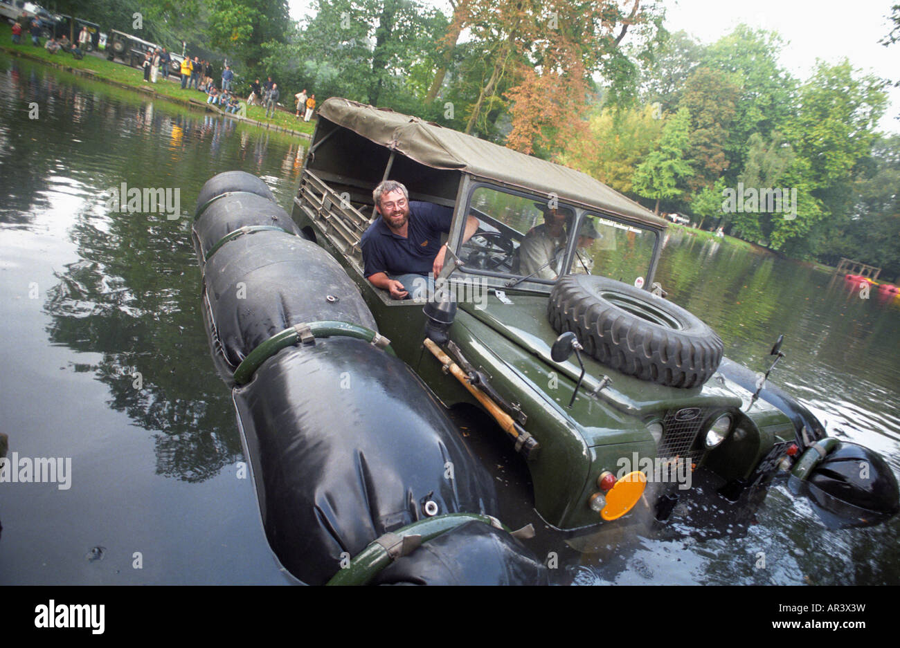 Historic 1963 APGP amphibious Land Rover with flotation bags swimming ...