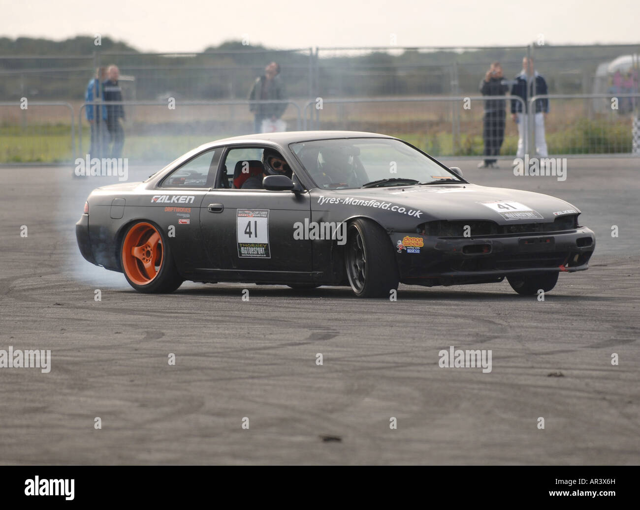 Drifting a rear wheel drive car Stock Photo - Alamy