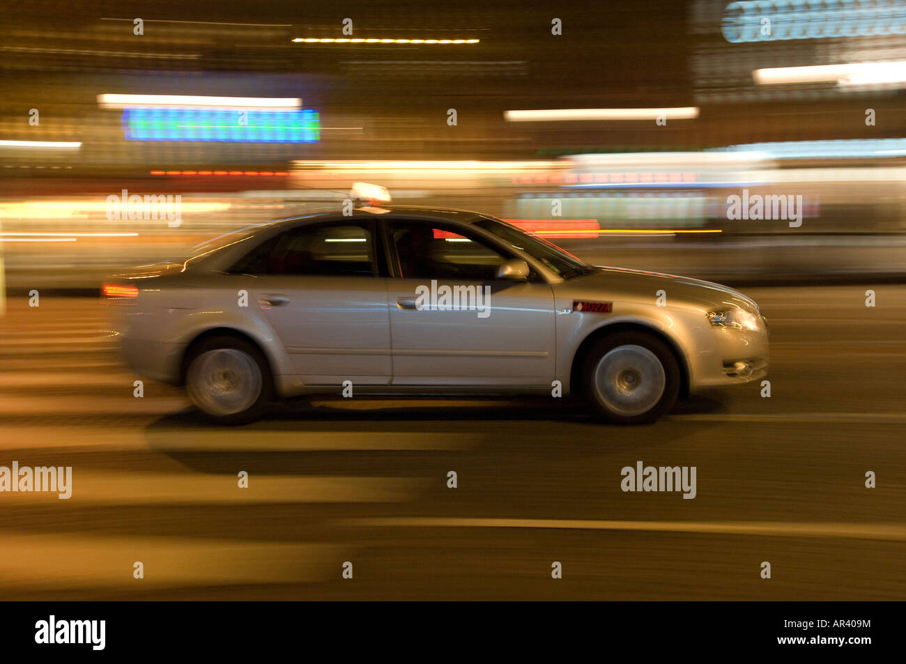 Late night Paris taxi cab driving on the Champs Elysées. Blurred ...