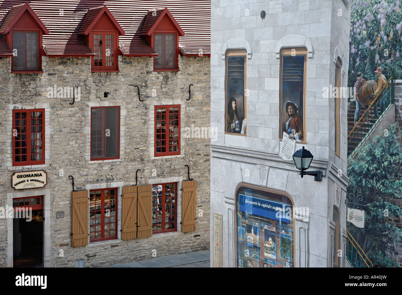 Fresque des Quebecois with surrounding stone buildings in Lower Town of ...