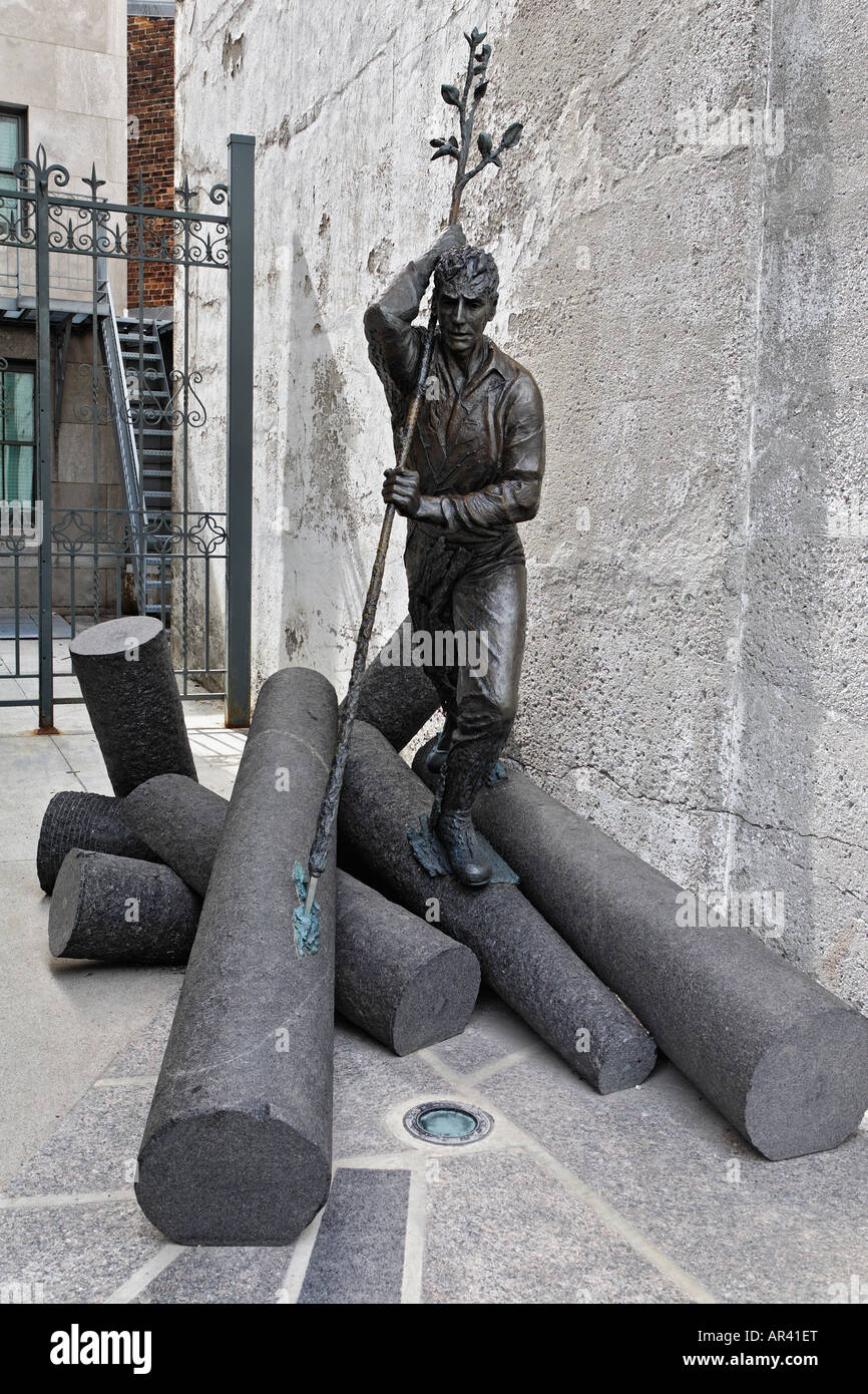 Price Memorial on Sainte Anne between two building titled L Homme ...