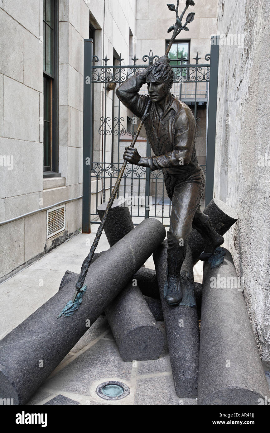 Price Memorial on Sainte Anne between two building titled L Homme ...