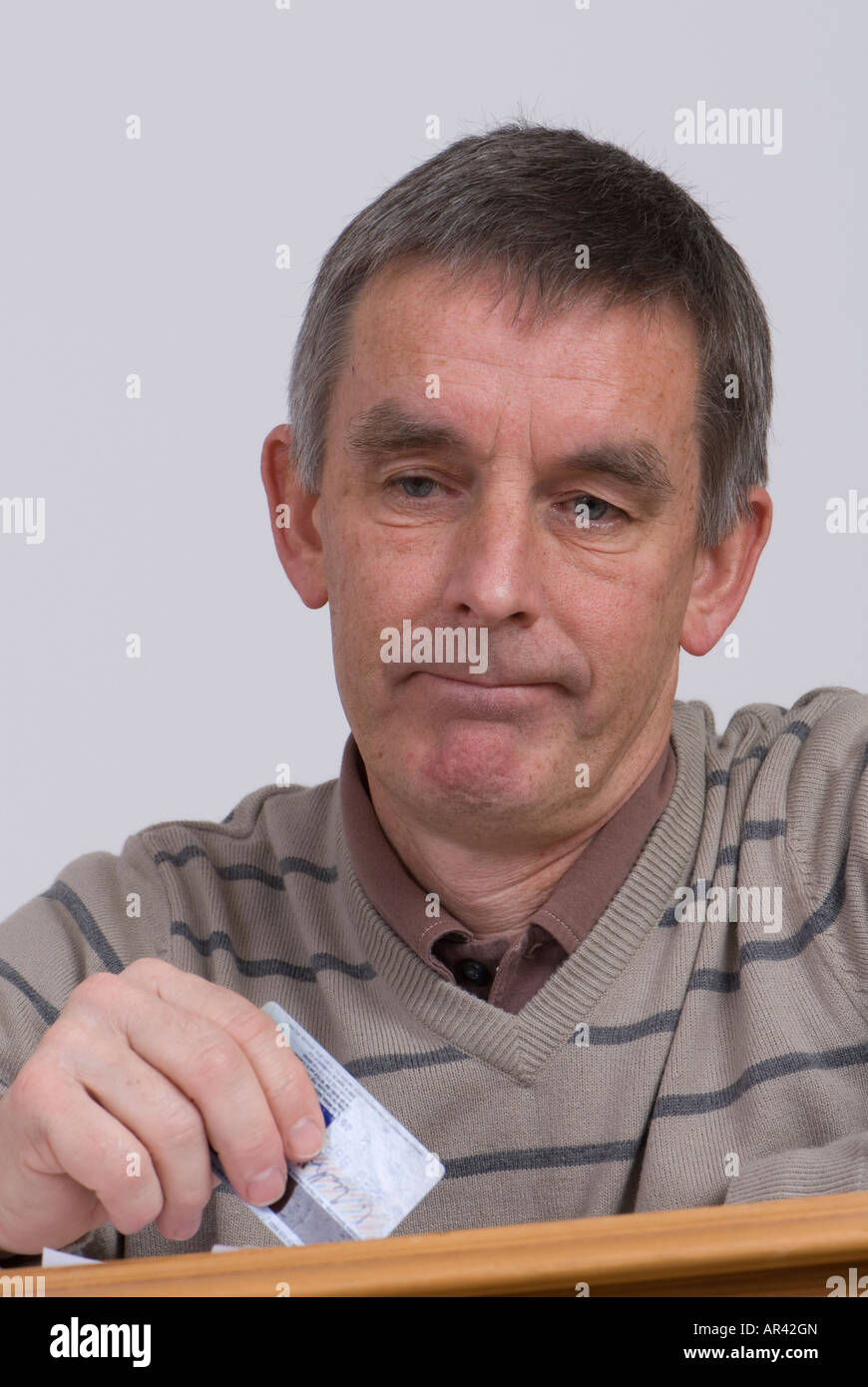 man worried about money Stock Photo - Alamy