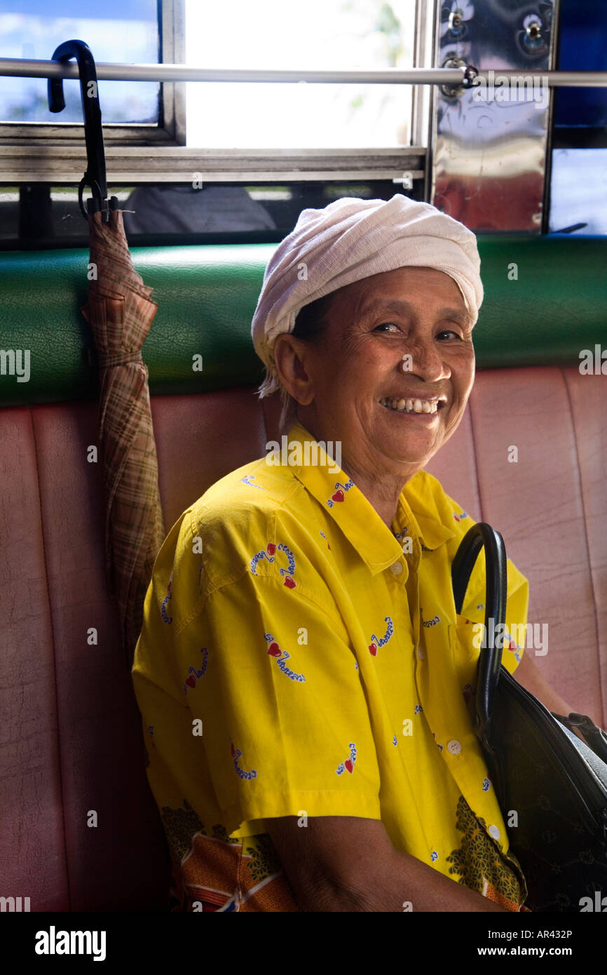 Woman passenger on a bus in Chiang Rai, Thailand Stock Photo - Alamy