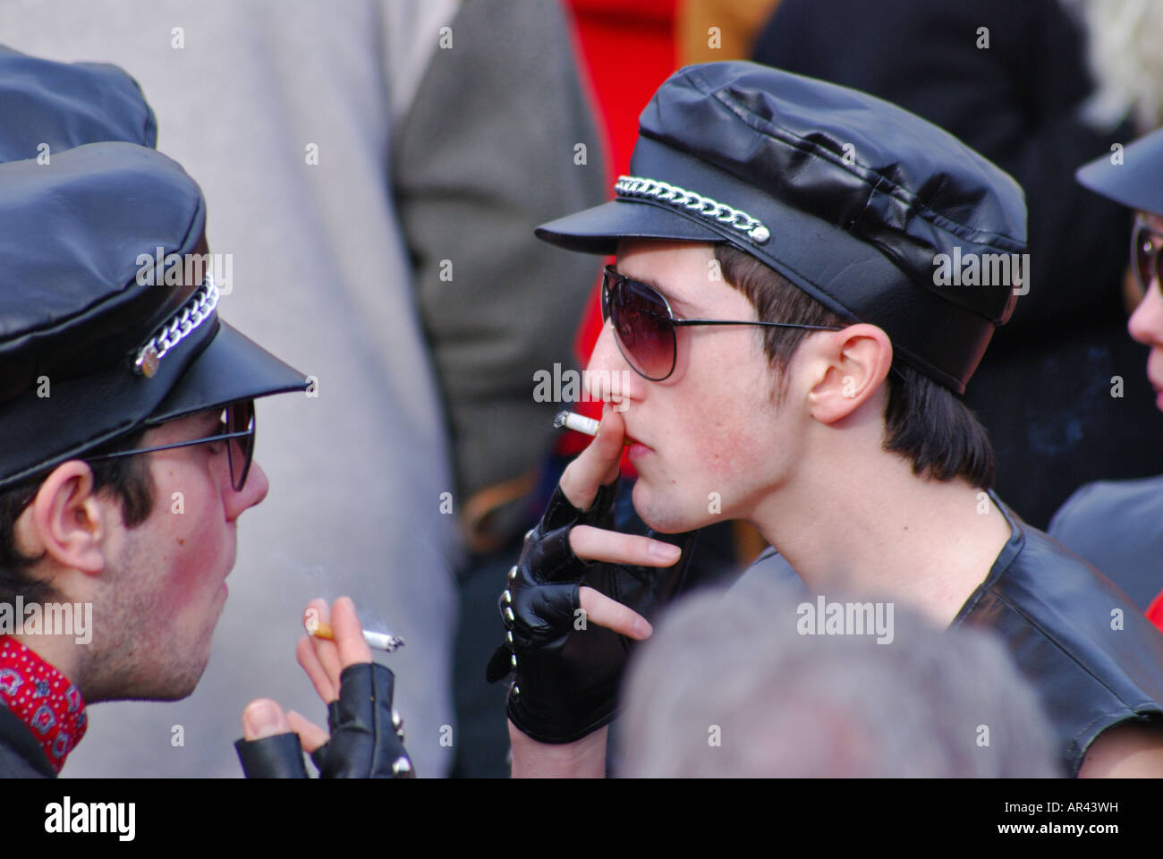 Carnival in Munich, young man smoking Stock Photo - Alamy