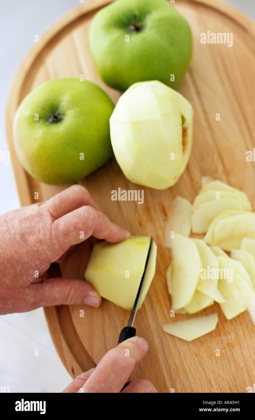 Apple being sliced hi-res stock photography and images - Alamy