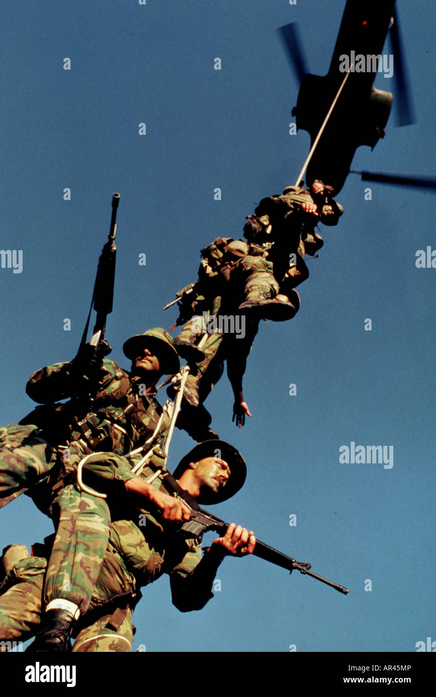 Marines on a SPIE RIG. a rope device that will extracate Marines very ...