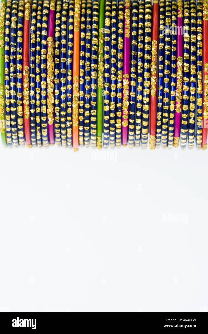 Indian glass coloured bangles on white background Stock Photo - Alamy