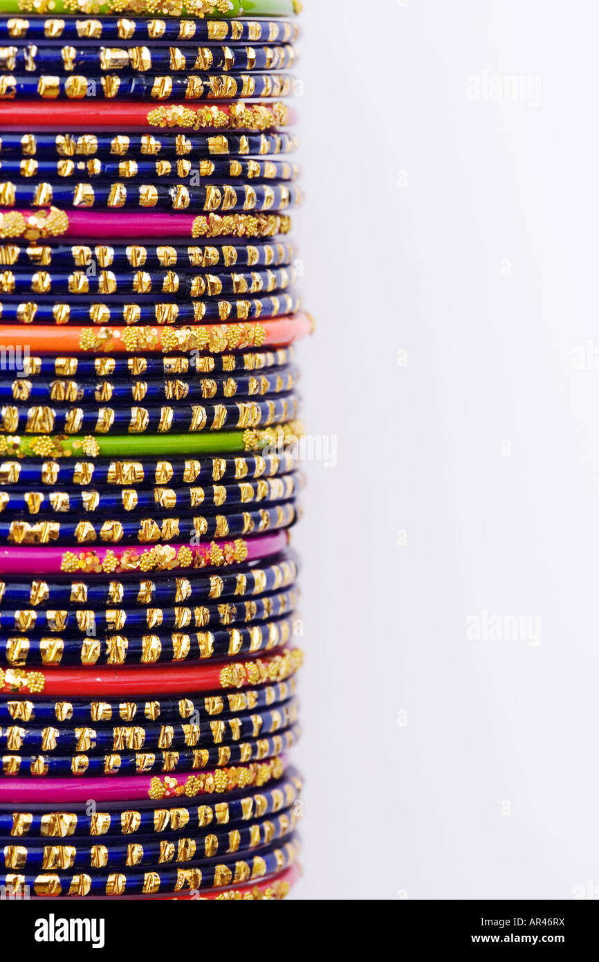 Indian glass coloured bangles on white background Stock Photo - Alamy