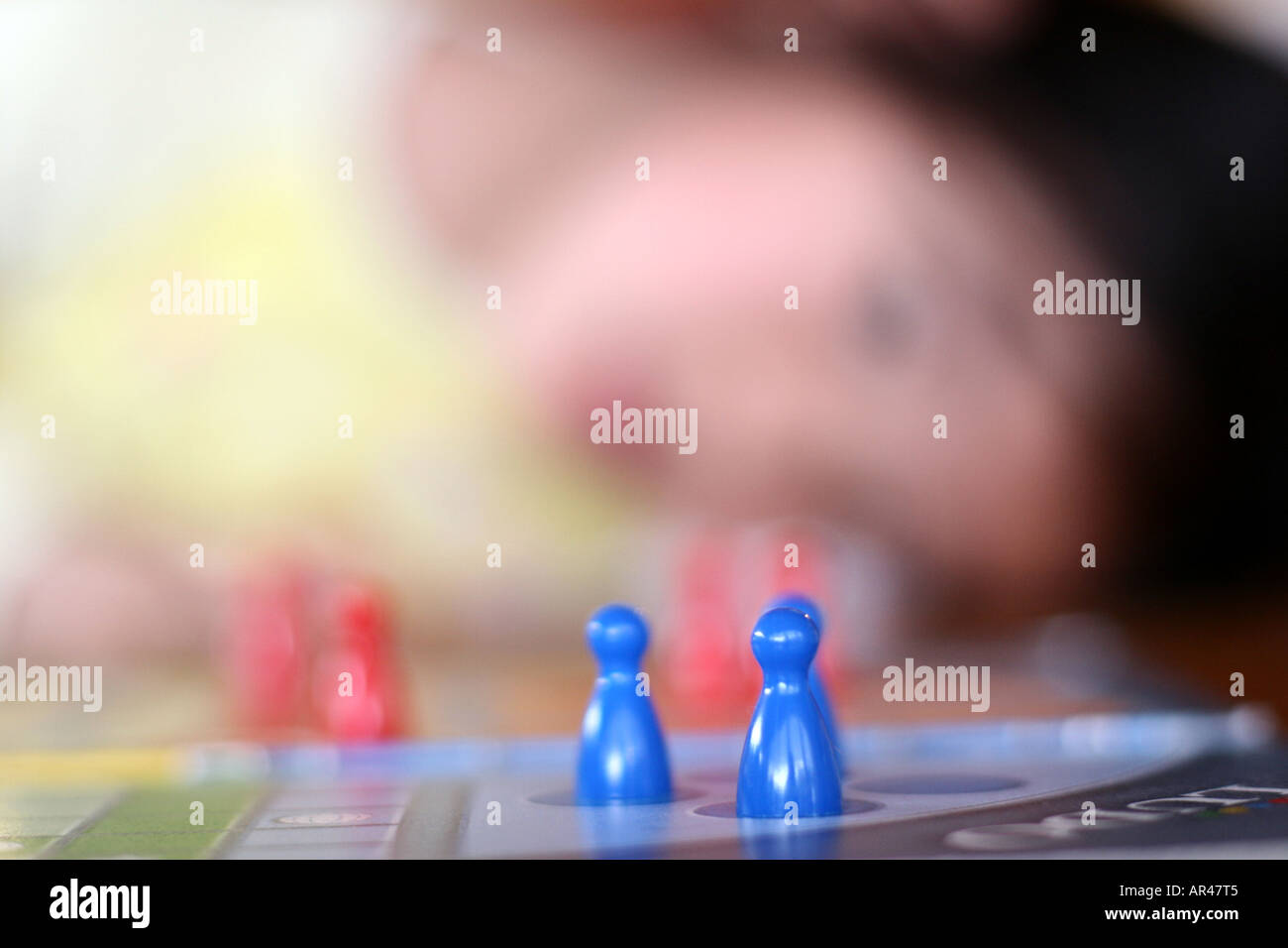 child playing indoor game Stock Photo - Alamy