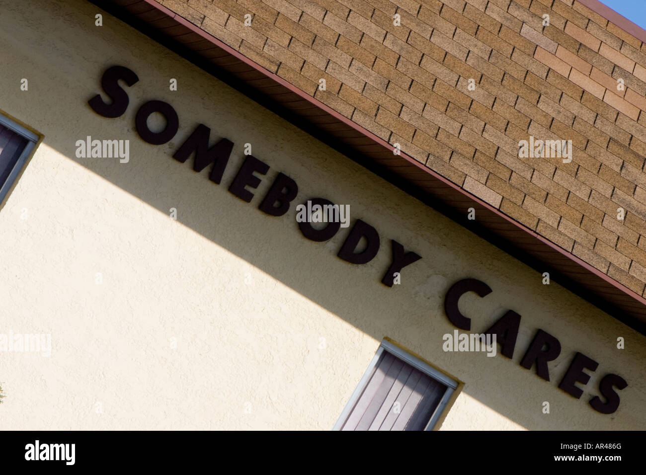 Somebody Cares Sign Stock Photo - Alamy