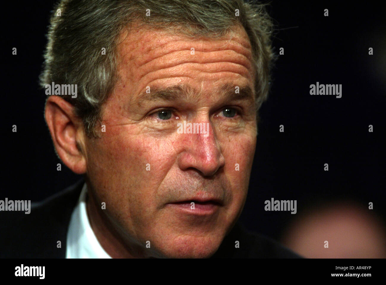 GW Bush sending a message to Sadam during an event with workers to ...