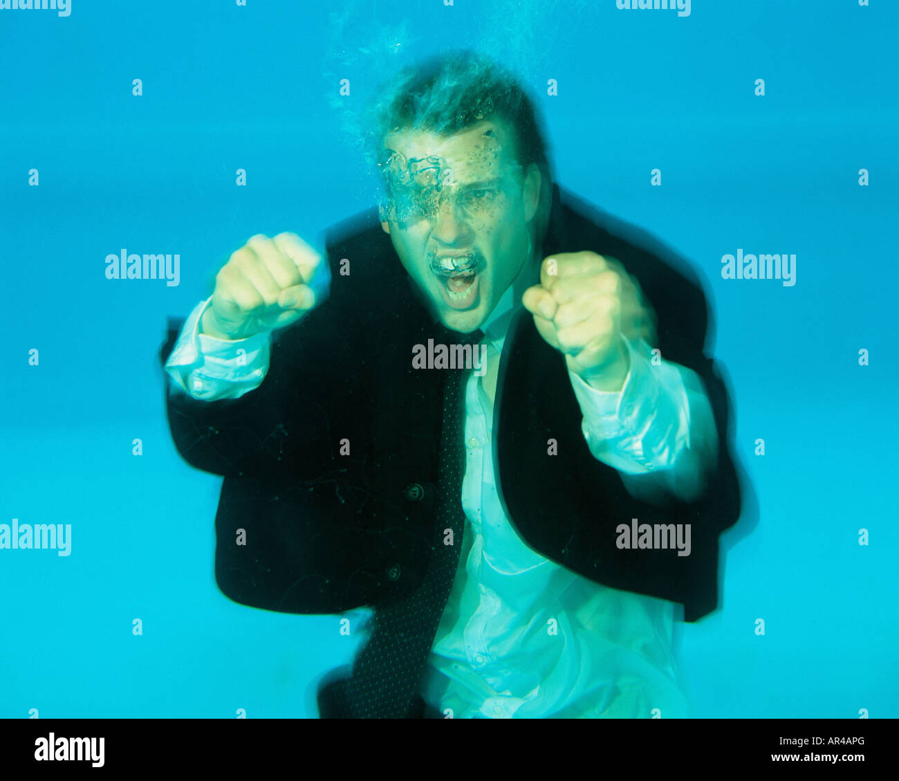 A man fighting under the water Stock Photo - Alamy