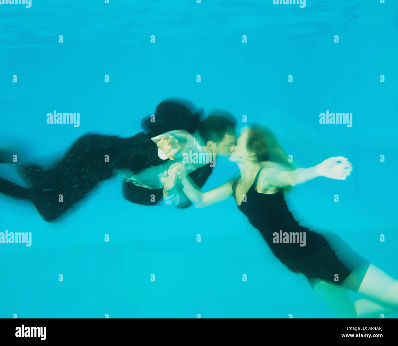 Couple Kissing At Swimming Pool High Resolution Stock Photography and ...