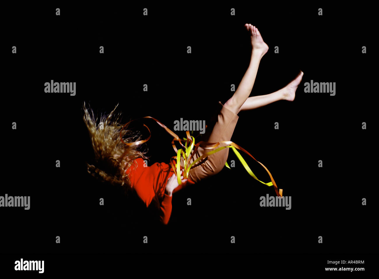 Woman falling hi-res stock photography and images - Alamy