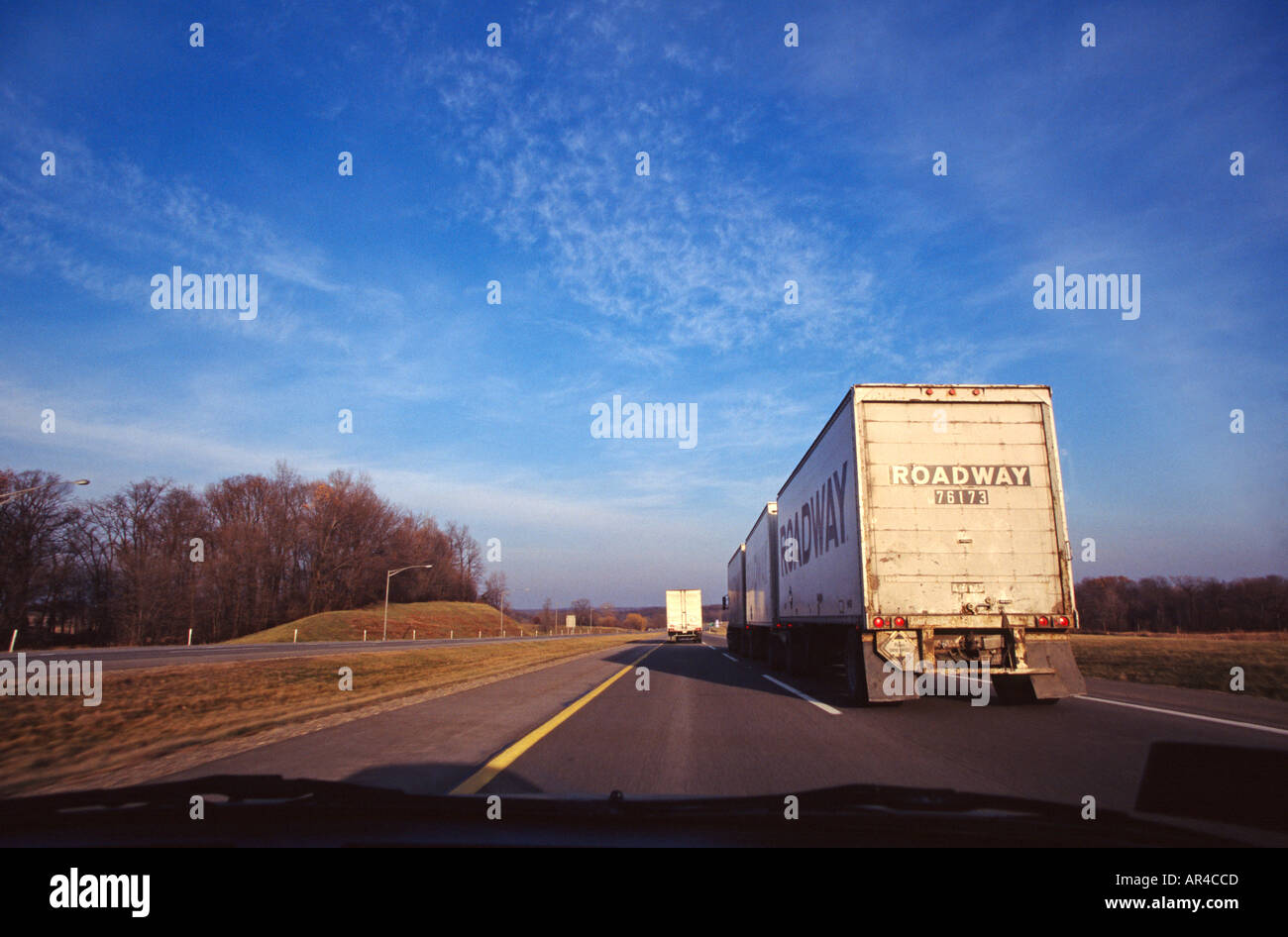 View through automobile windshield of semi tractor trailer on ...