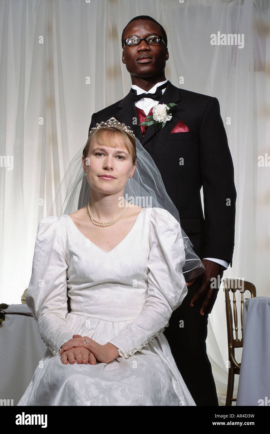 The newly-weds pose for a photograph Stock Photo - Alamy