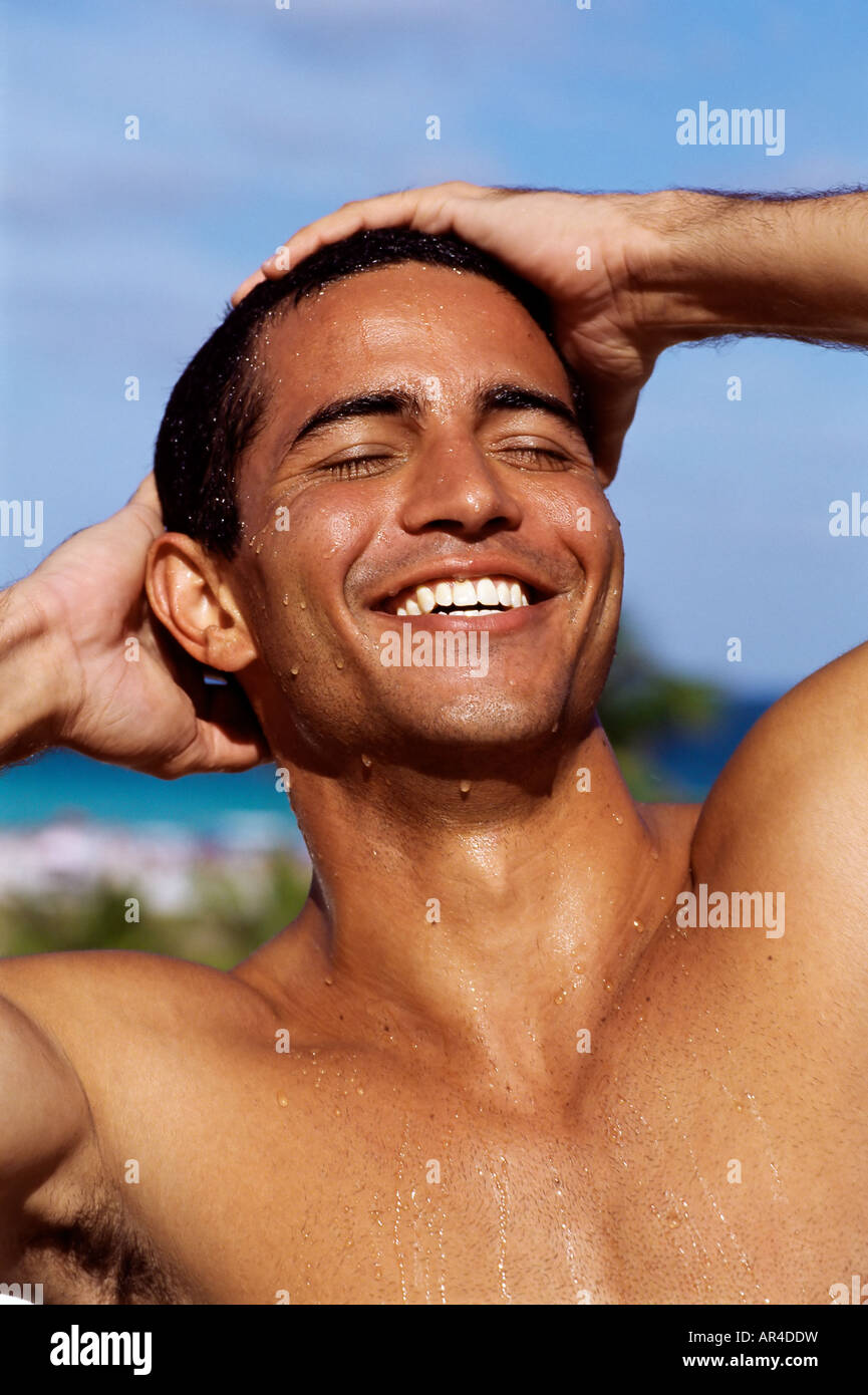 Portrait of smiling hispanic man Stock Photo - Alamy
