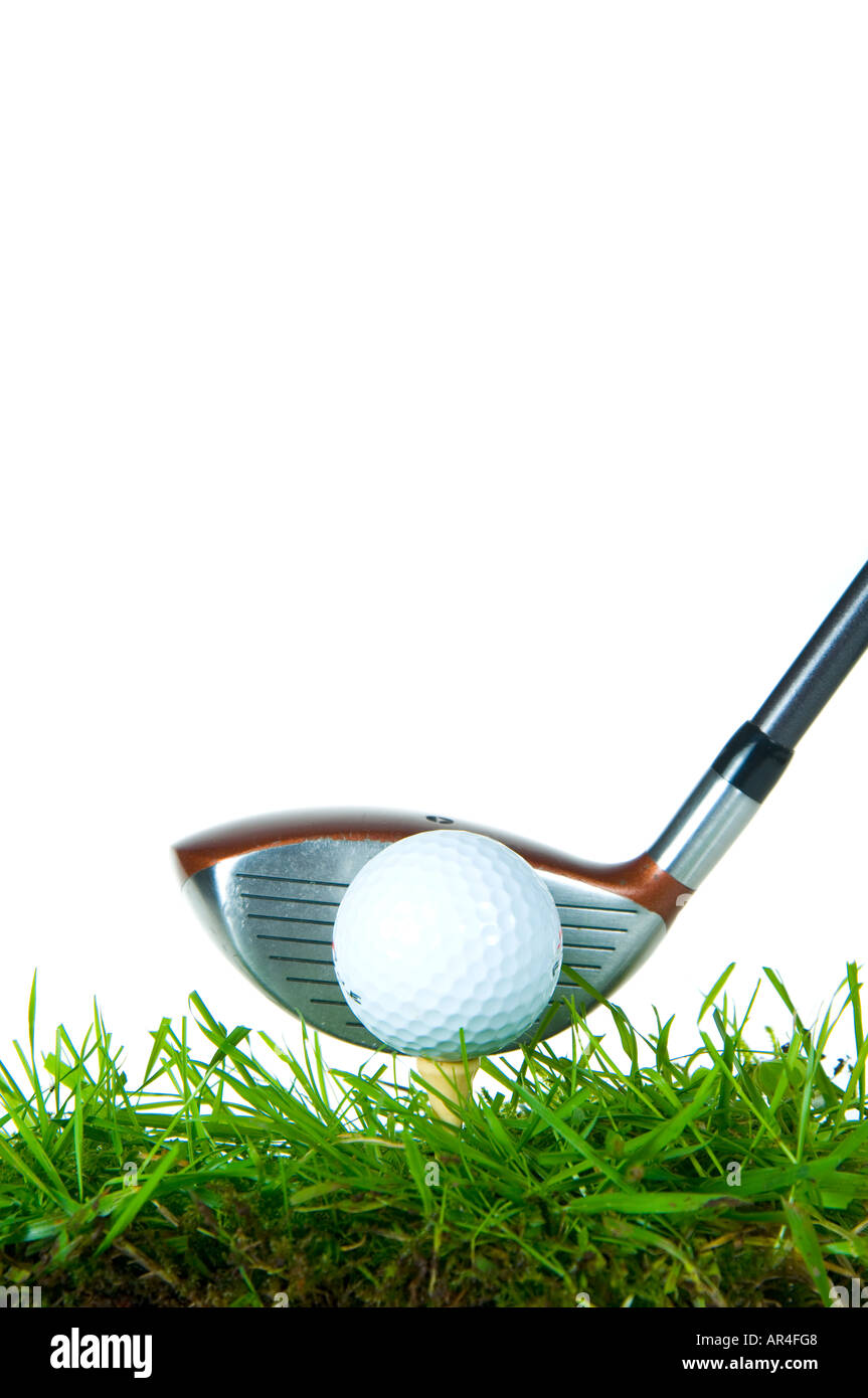 white background shot of a golf ball sitting on a tee on grass with a ...