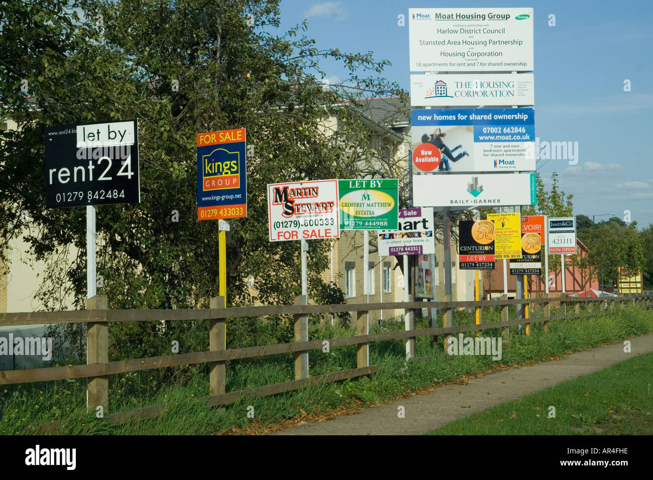 estate agents housing signs Stock Photo - Alamy