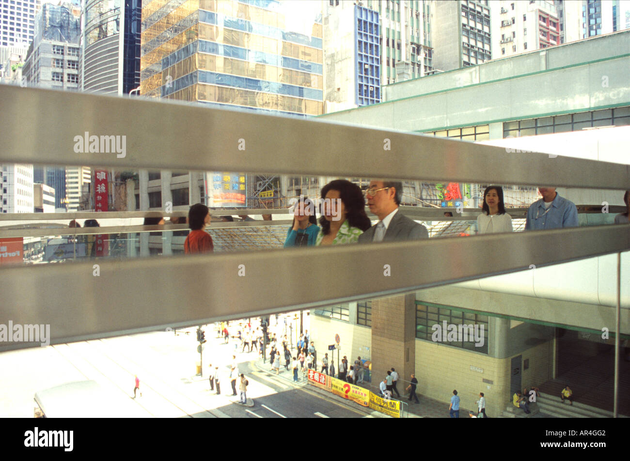 A mirrored image on a HongKong pedestrian walkway Stock Photo - Alamy