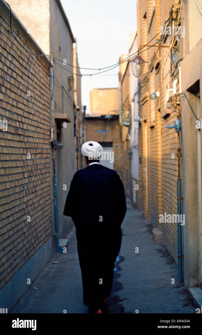 Mullah on a narrow allay Qom Iran Stock Photo - Alamy