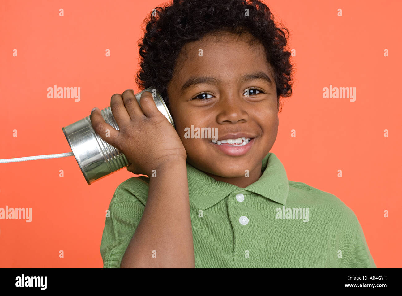 Boy can string hi-res stock photography and images - Alamy