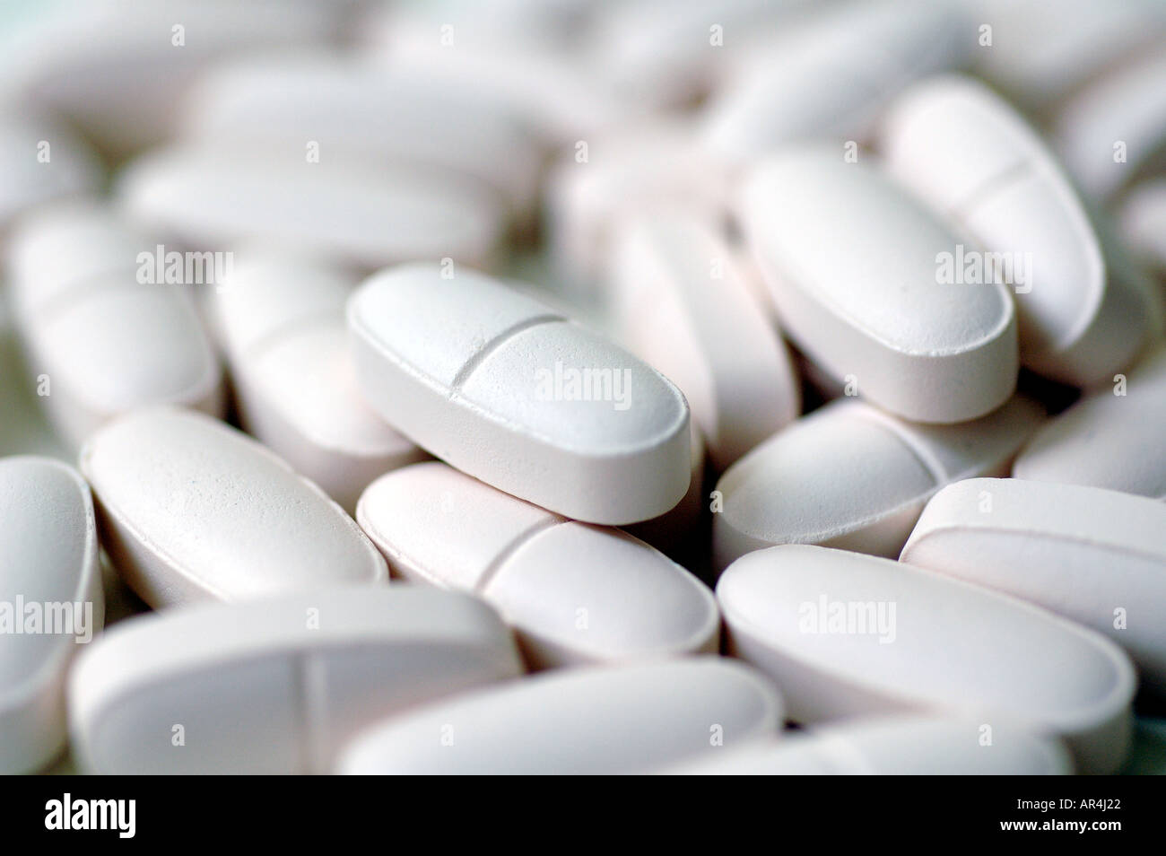 Stack of medicinal tablets or pills Stock Photo - Alamy