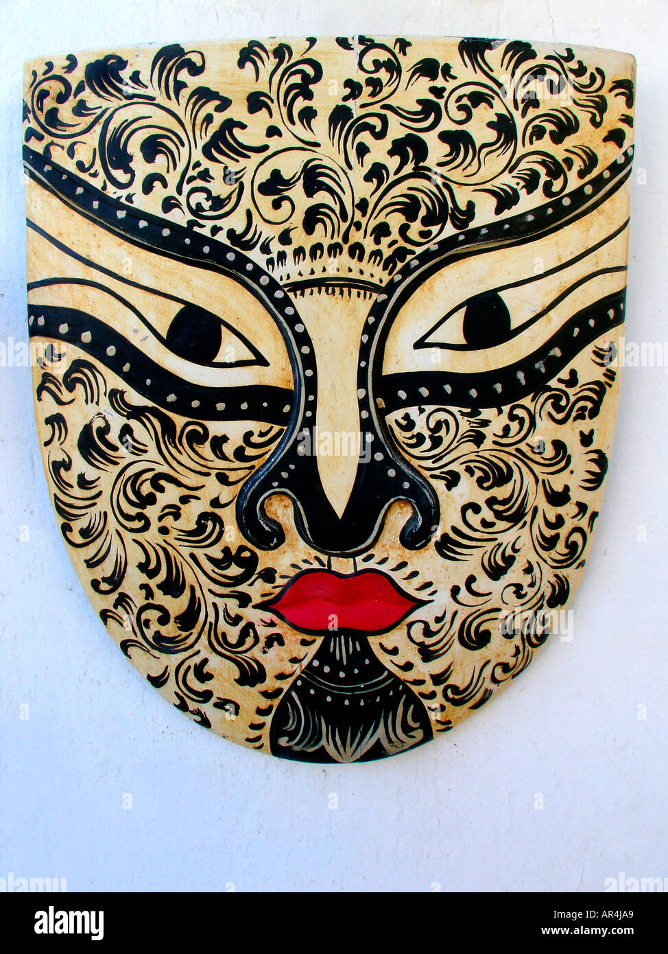 Wooden tribal mask from Thailand Stock Photo - Alamy