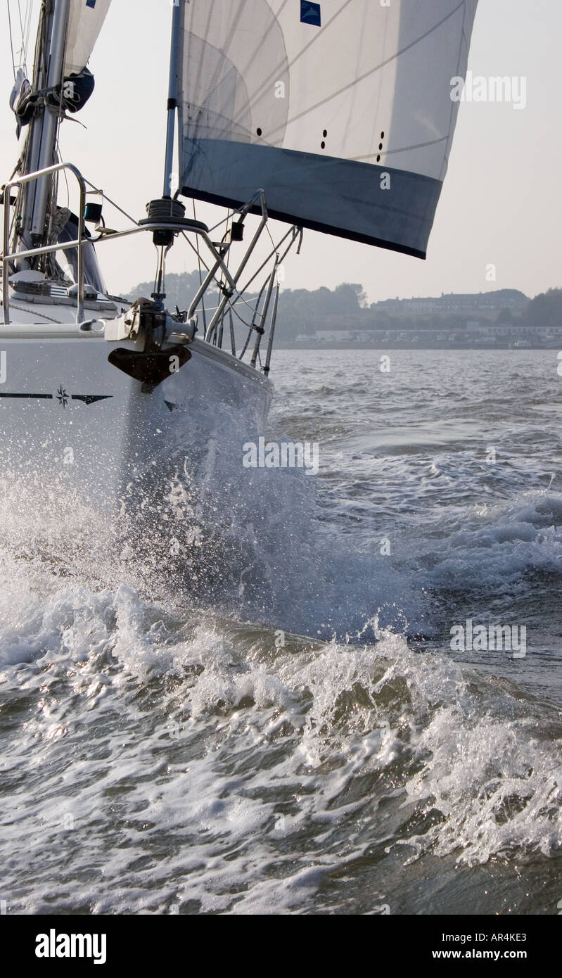 colour image off looking across the sea with a boat sailing in the ...