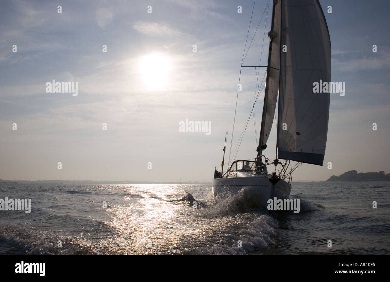 Sailing boat across the sea hi-res stock photography and images - Alamy