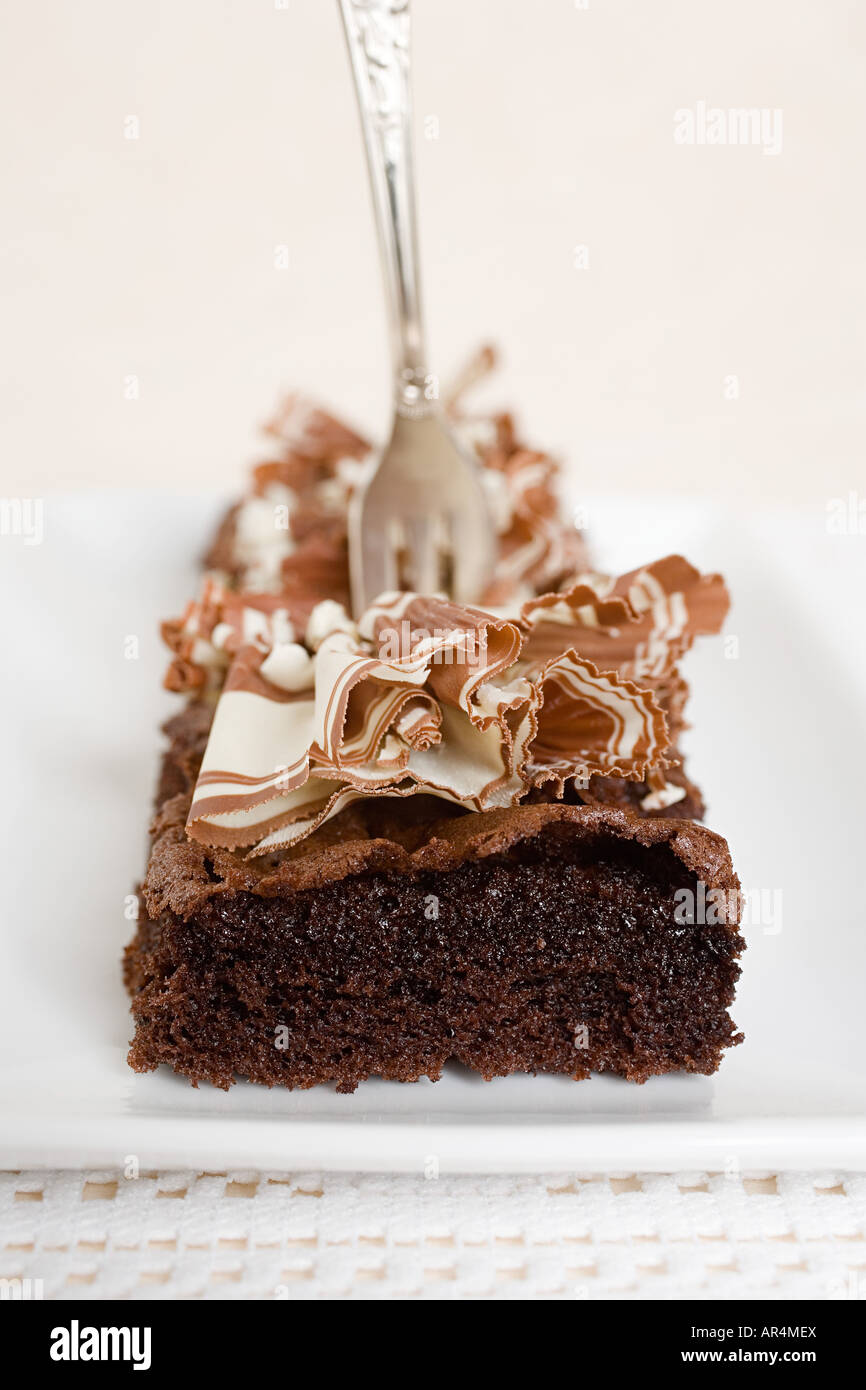 A fork in a chocolate cake Stock Photo - Alamy