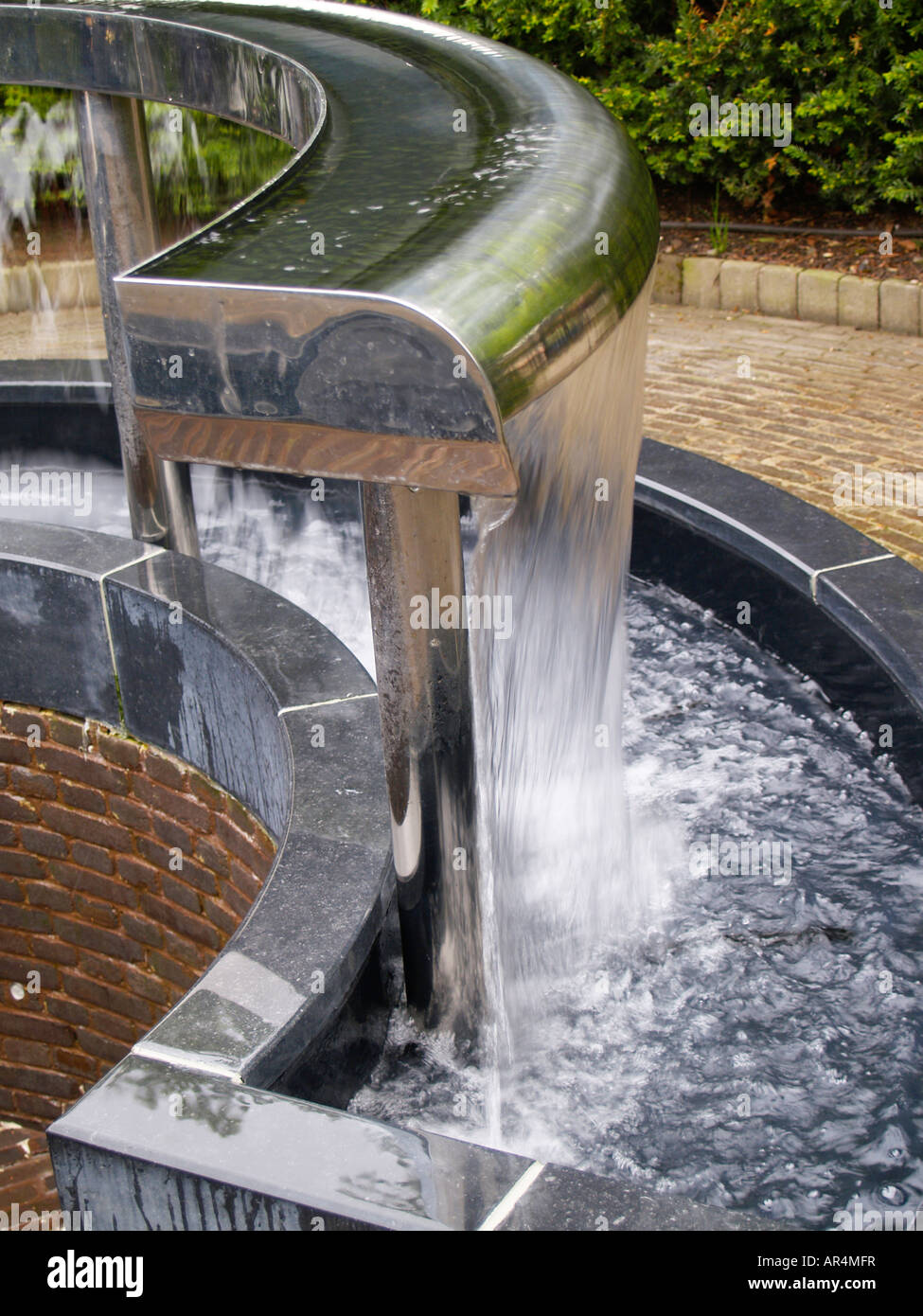 Detail of a Water feature creating a semi-circular curtain of water ... Detail of a Water feature creating a semi-circular curtain of water ...