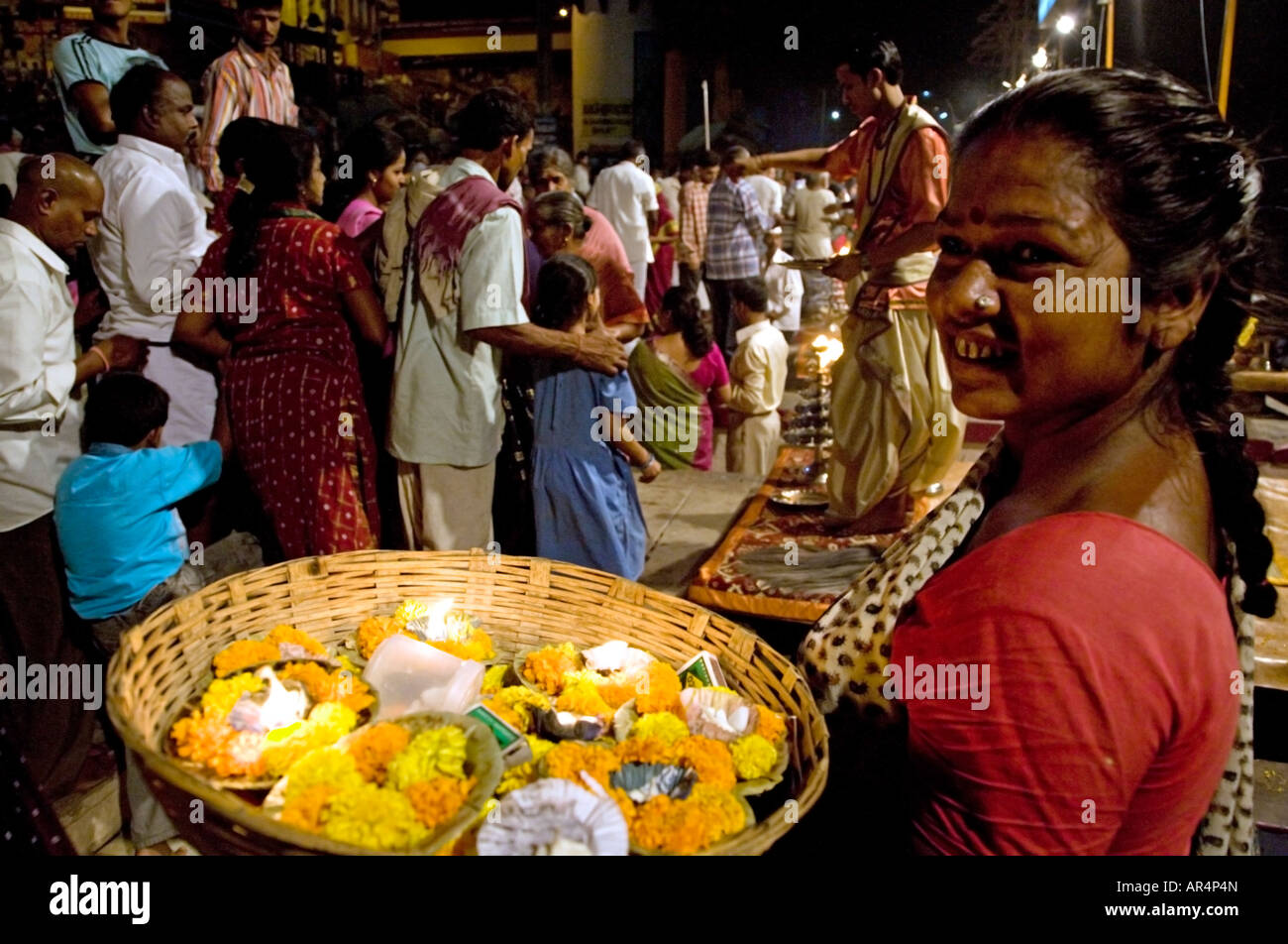 Butter floating lamps seller. Dasaswamedh Ghat. Ganges river. Varanasi ...