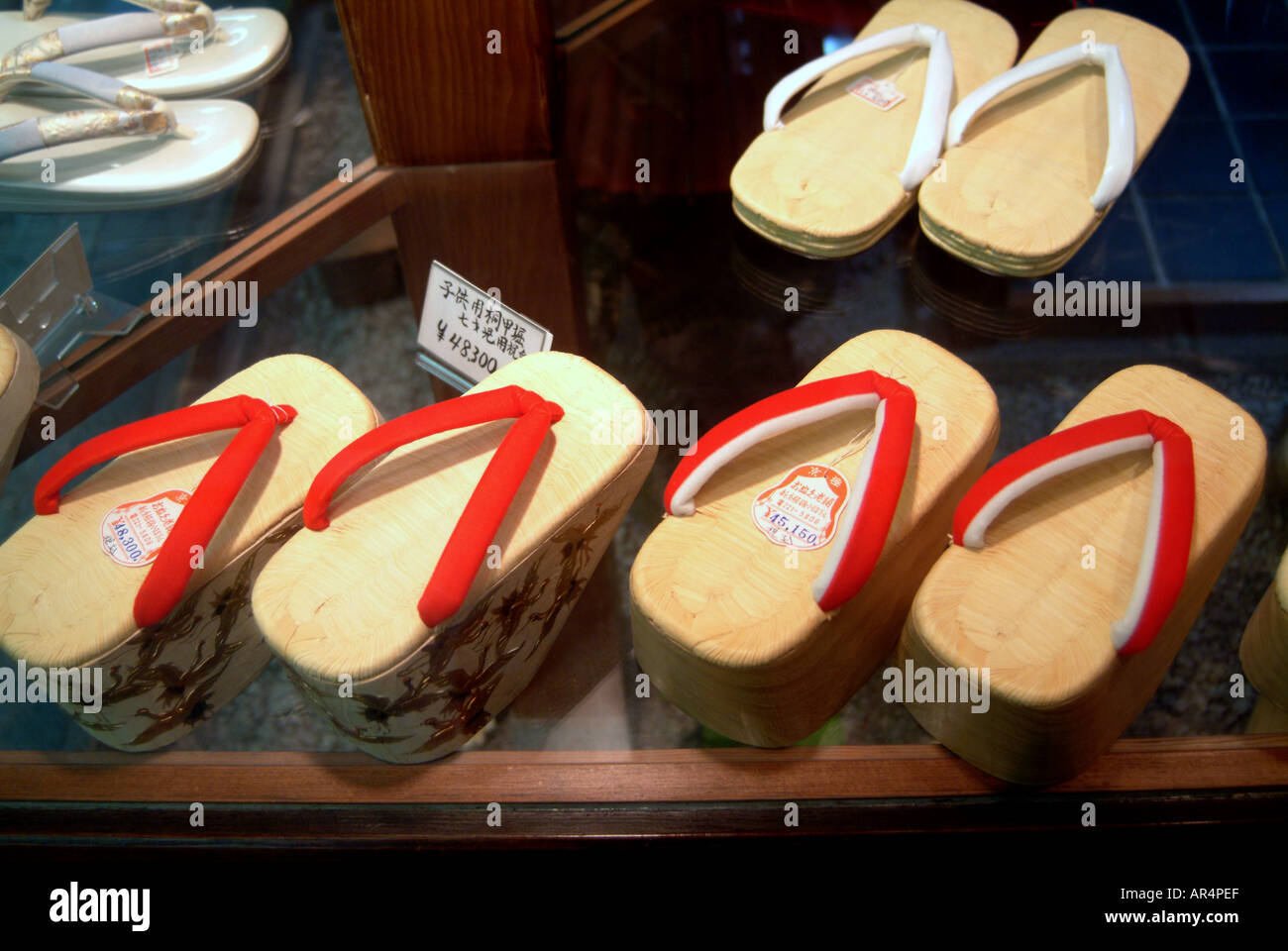 Maiko (apprentice geisha) shoes in a shop window Kyoto Japan Stock ...