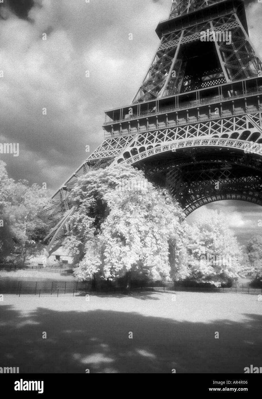 Base of the Eiffel Tower in grainy infrared Stock Photo - Alamy