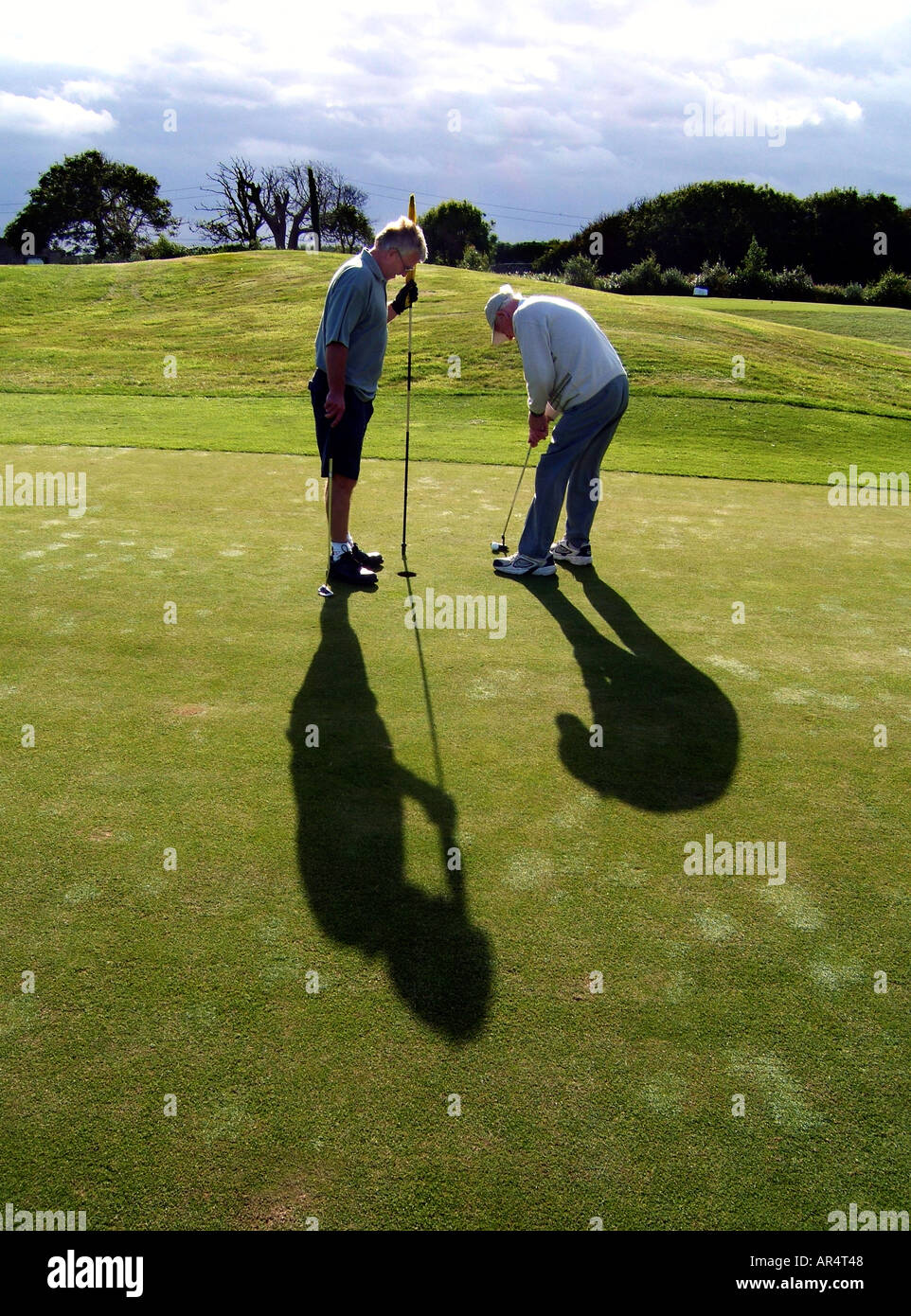 Friendly game of golf hi-res stock photography and images - Alamy