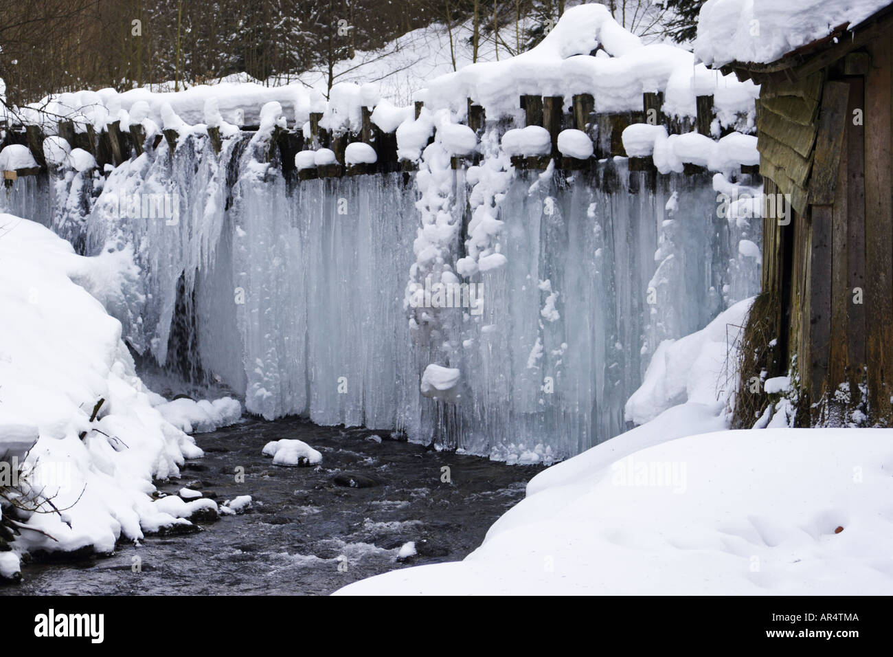 waterfall frozen to ice Stock Photo - Alamy