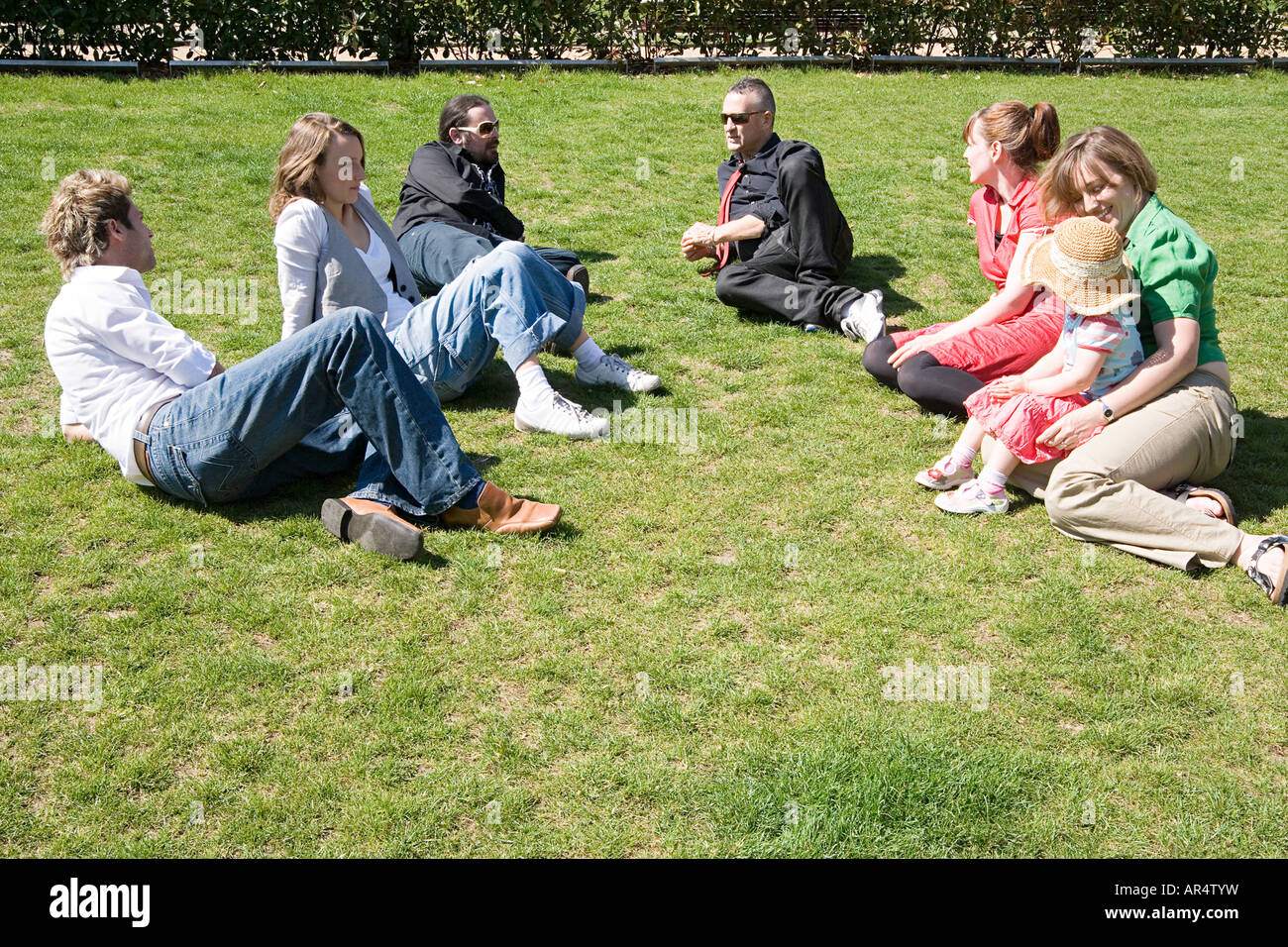 People relaxing in a park Stock Photo - Alamy