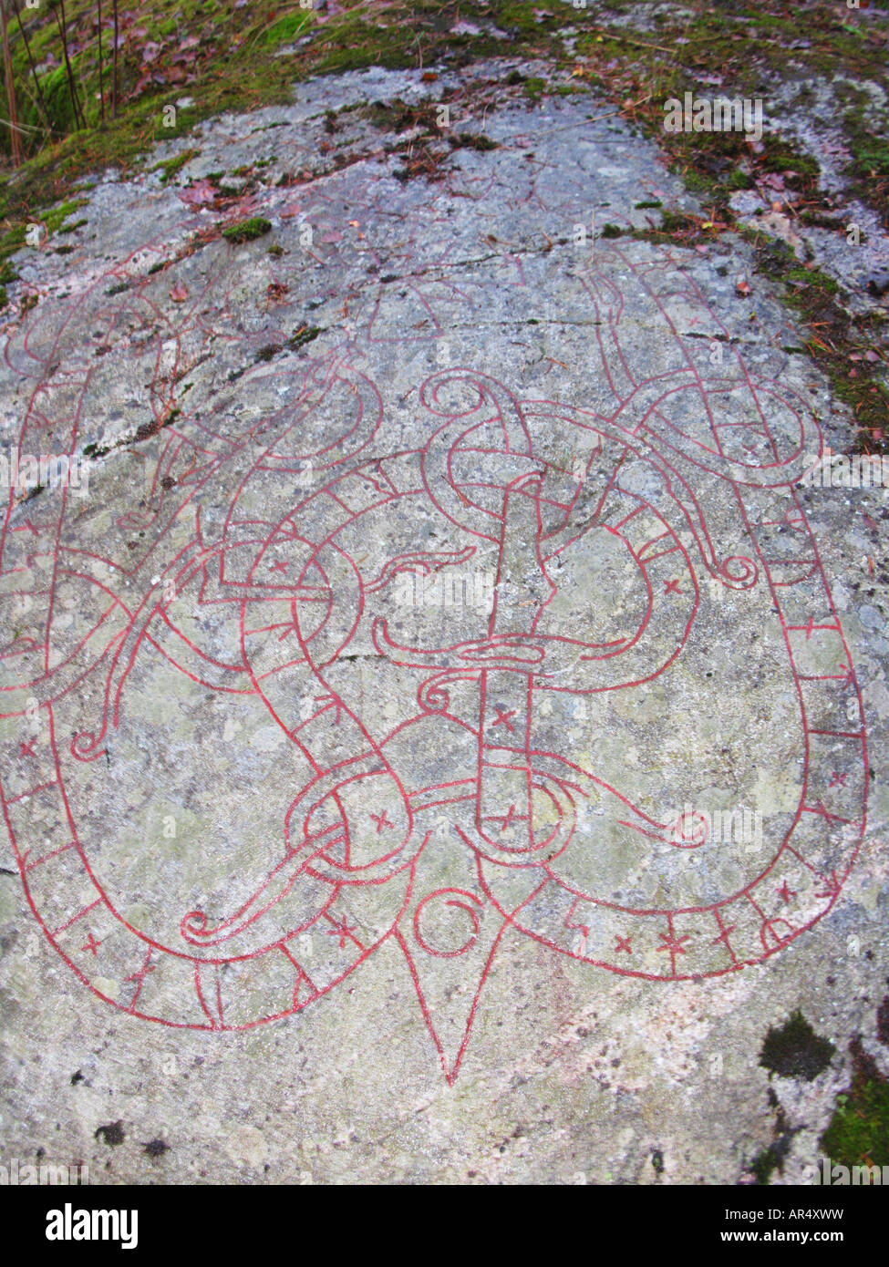 Rock carving from ca 1000 Stock Photo - Alamy