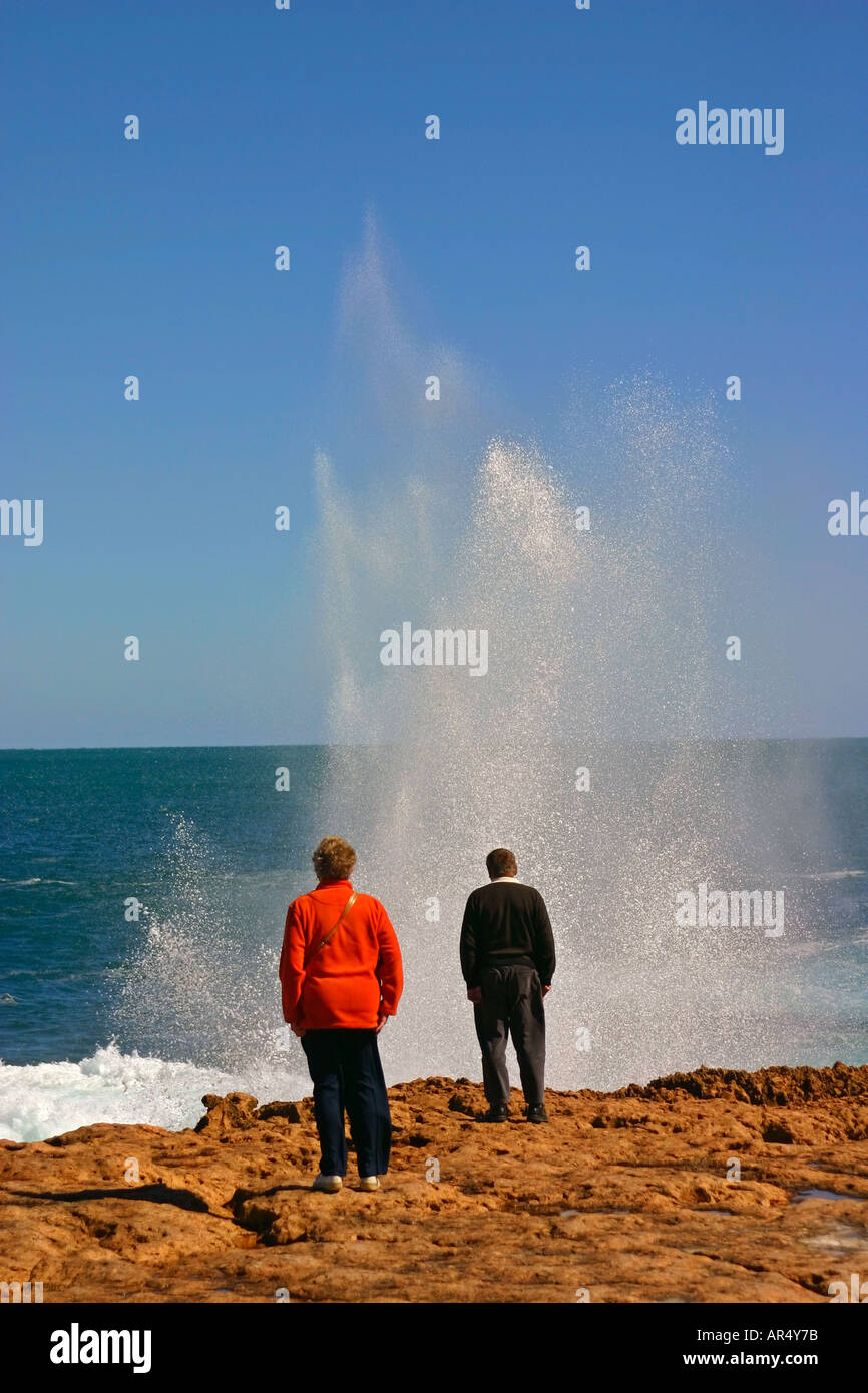 Couple watch sea water shoot up through blowholes along Cape Cuvier ...