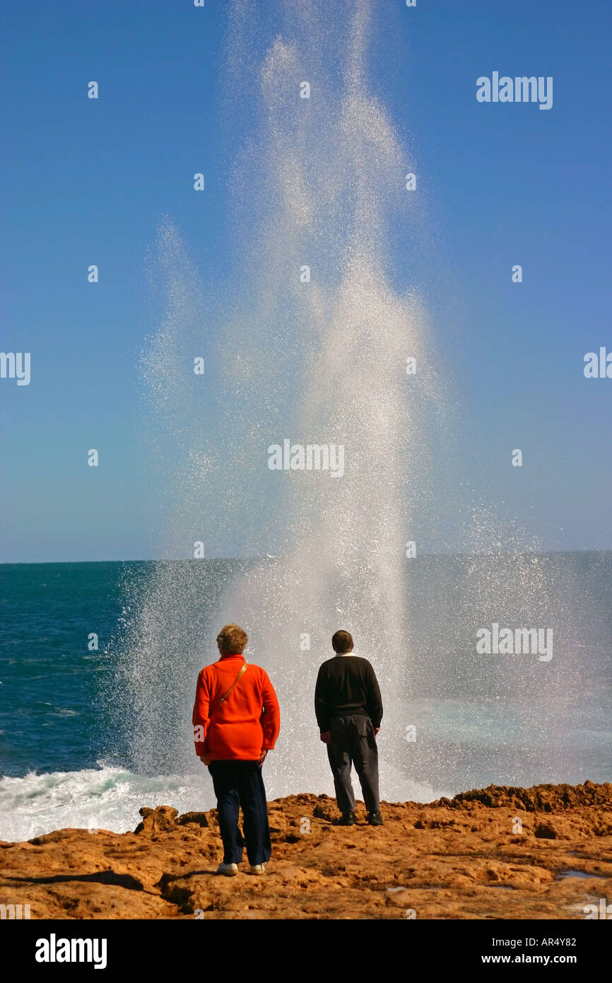 Couple watch sea water shoot up through blowholes along Cape Cuvier ...