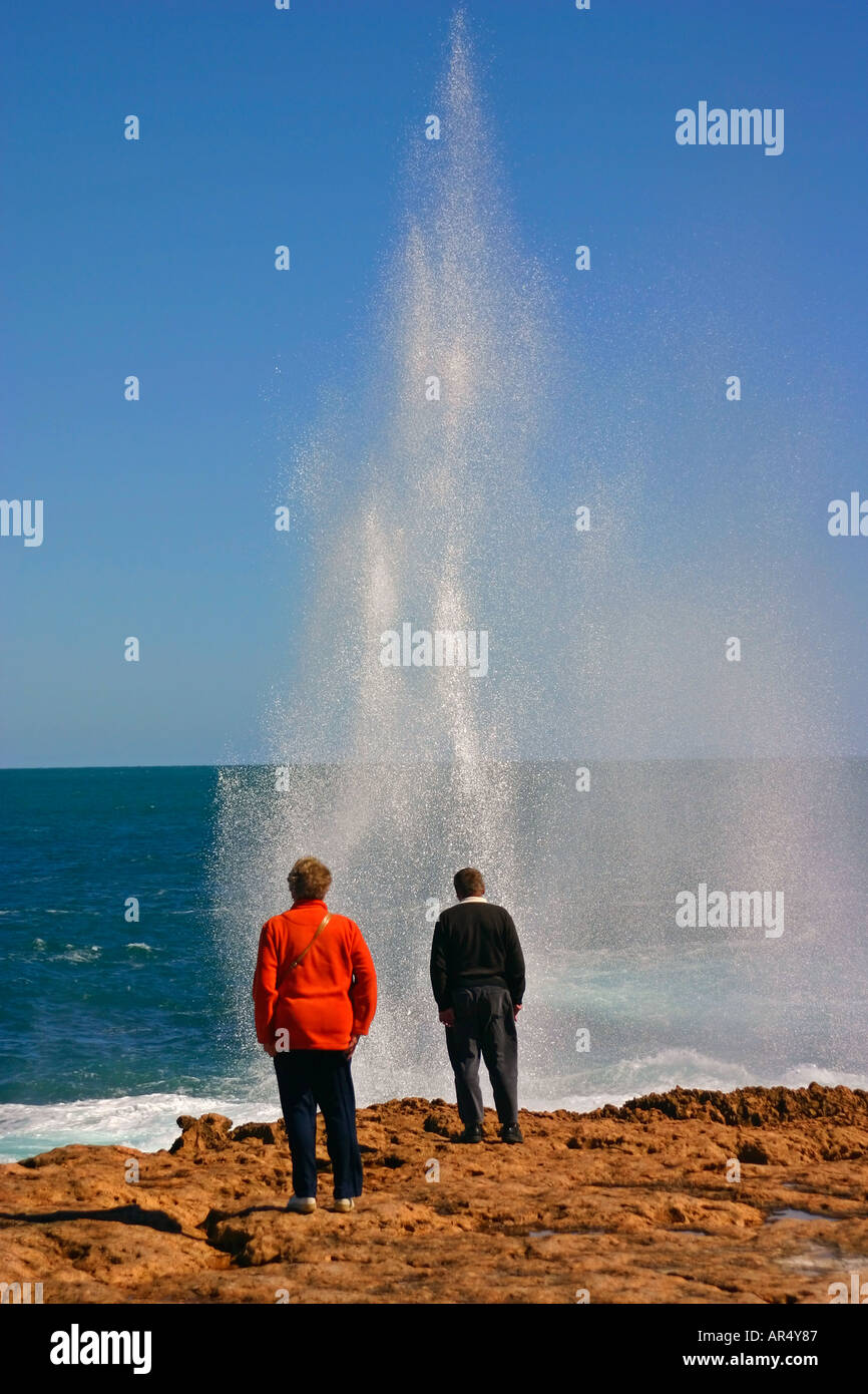 Couple watch sea water shoot up through blowholes along Cape Cuvier ...