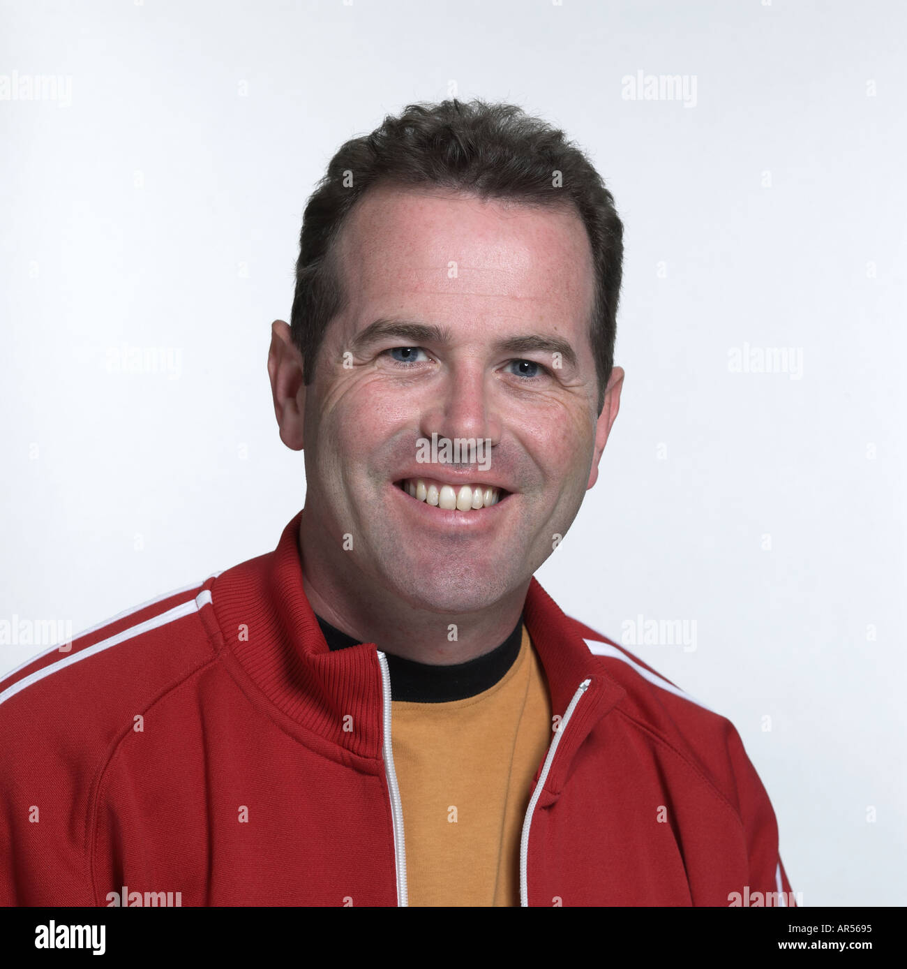 Red tracksuit top hi-res stock photography and images - Alamy