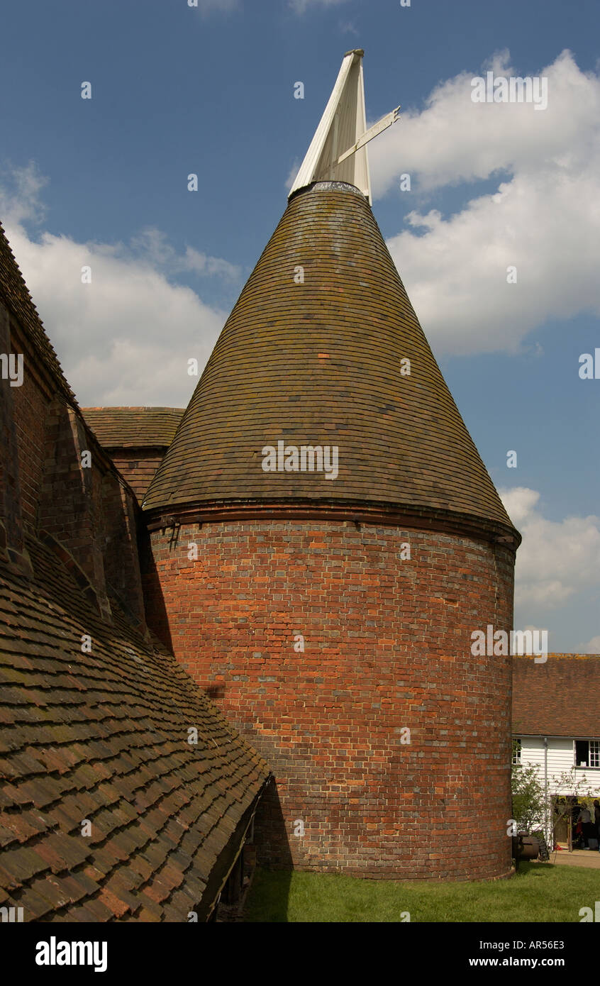 kentish oast house at sissinghurst in kent with a blue sky with white ...