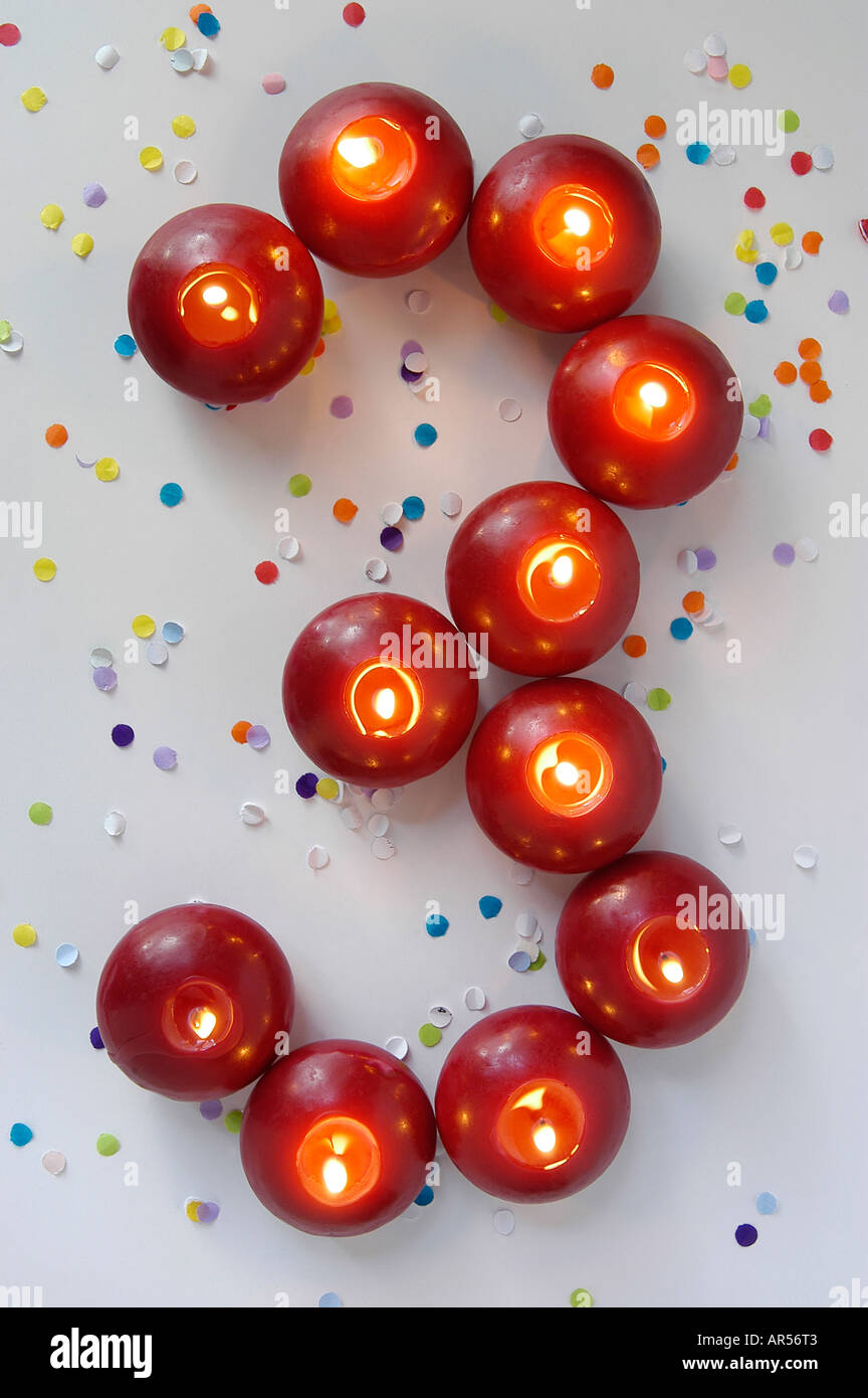 Number 3 made from candles Stock Photo - Alamy
