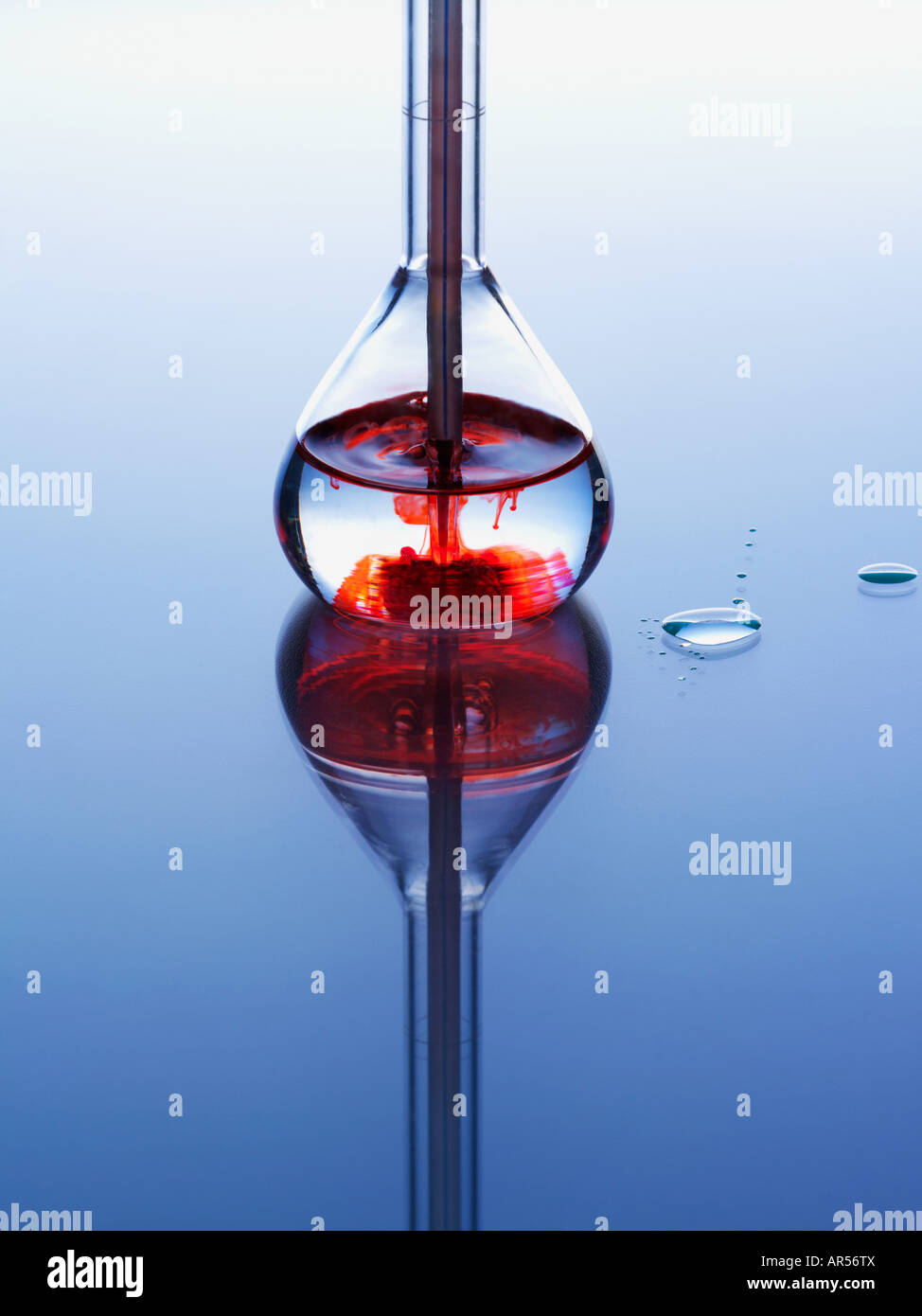 Liquid in a scientific flask Stock Photo - Alamy